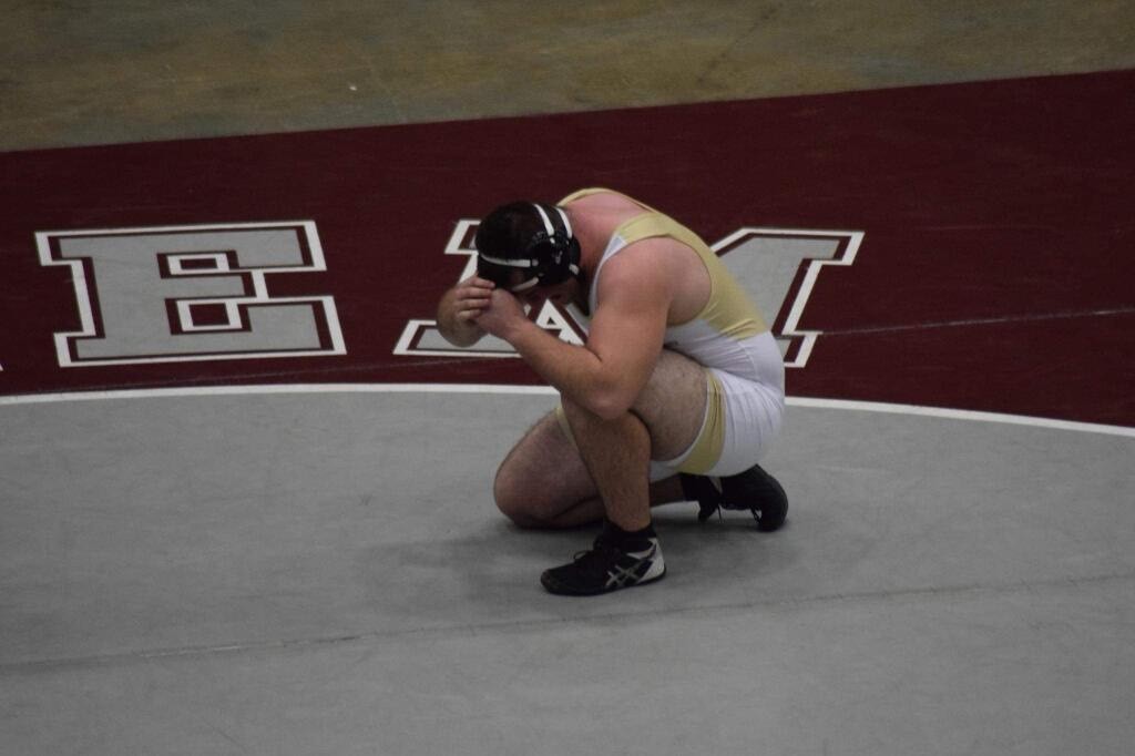 Jacob Carter: A Heavyweight on the Mat and on His Knees